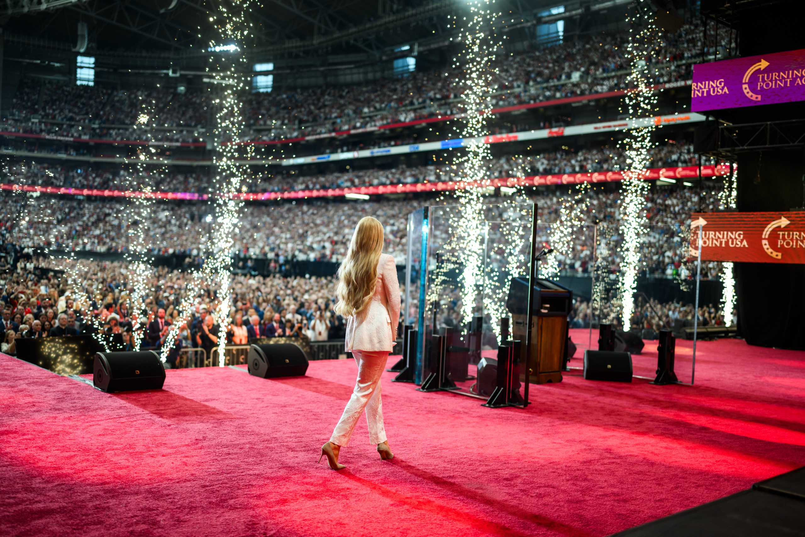 Erika Kirk walks onstage at_the_Memorial_Service_for_Charlie_Kirk ...